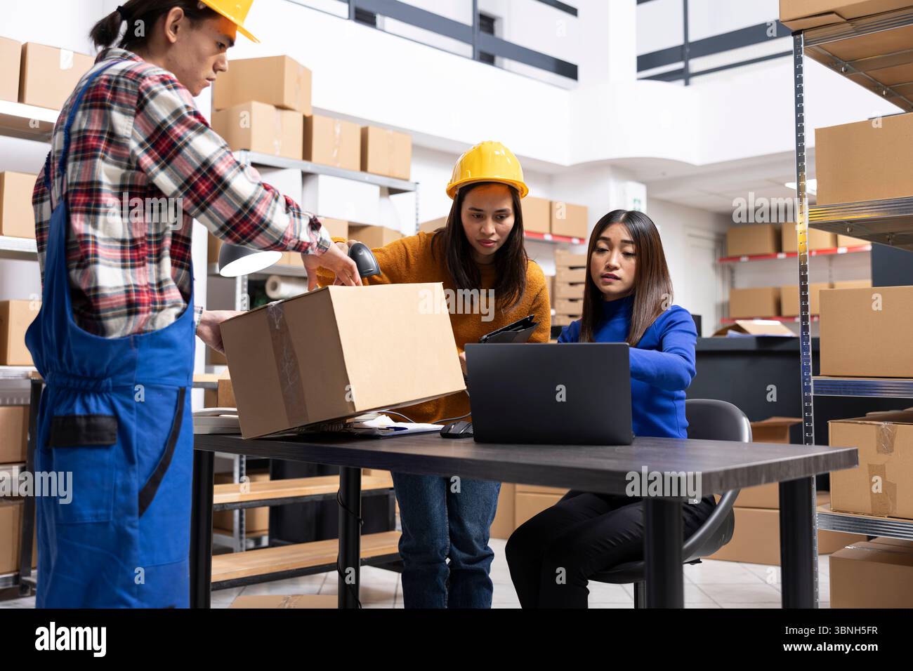 Asian employee applying shipping hi-res stock photography and images ...