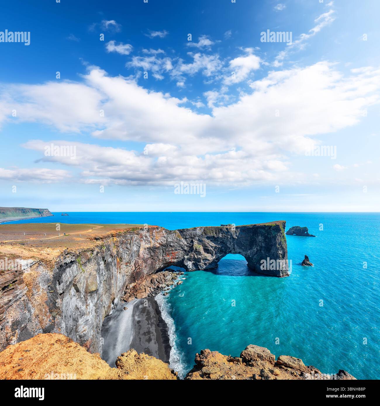 Impressive andscape with unique basalt arch on Dyrholaey Nature Reserve ...