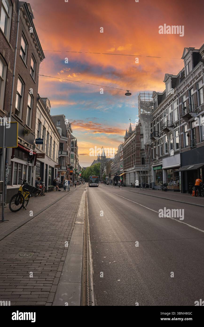 Sunset Over a Street in Utrecht with Dutch Buildings and a Bus Stock ...