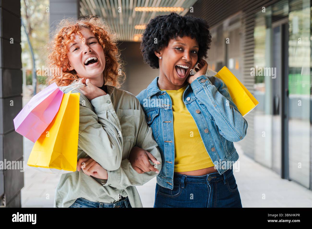 Two girls share joyful hi-res stock photography and images - Alamy