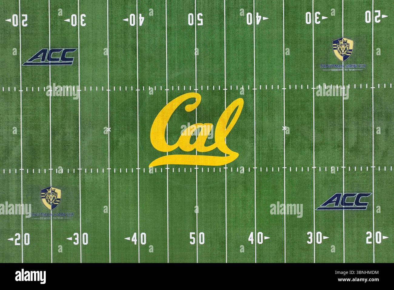 The California Golden Bears and ACC logos on the football field at ...