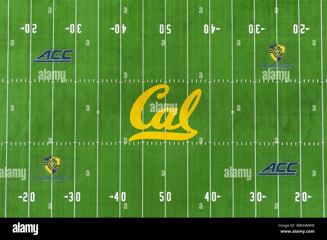The California Golden Bears and ACC logos on the football field at ...