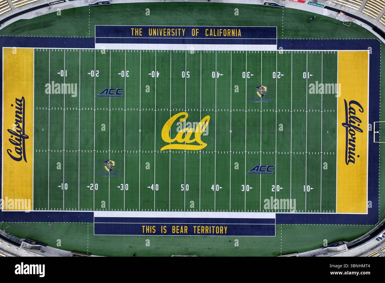The California Golden Bears and ACC logos on the football field at ...