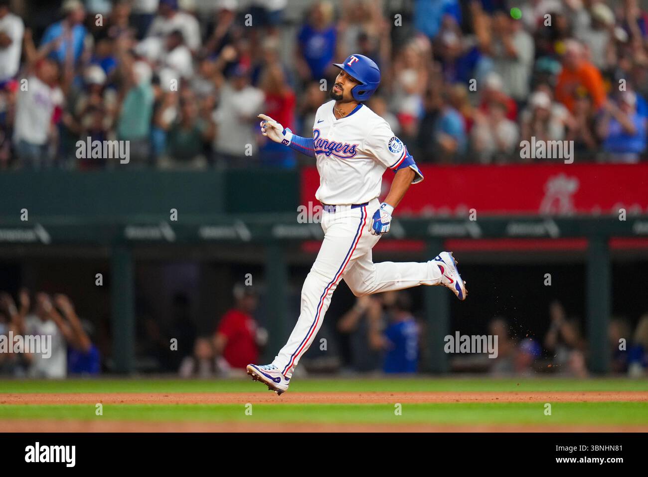 Texas Rangers' Marcus Semien runs the bases after hitting a three-run ...
