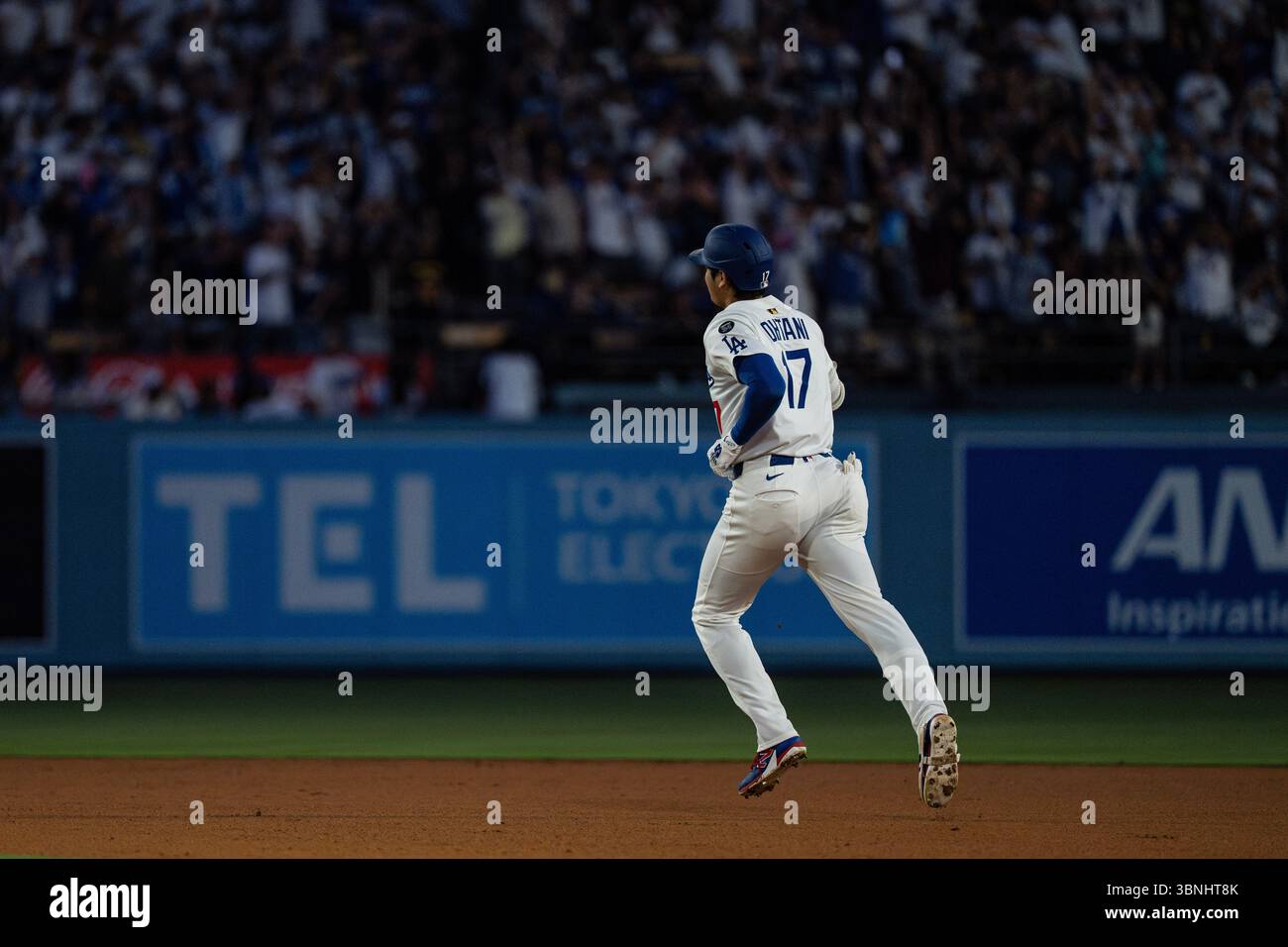 Los Angeles Dodgers two-way player Shohei Ohtani (17) rounds the bases ...