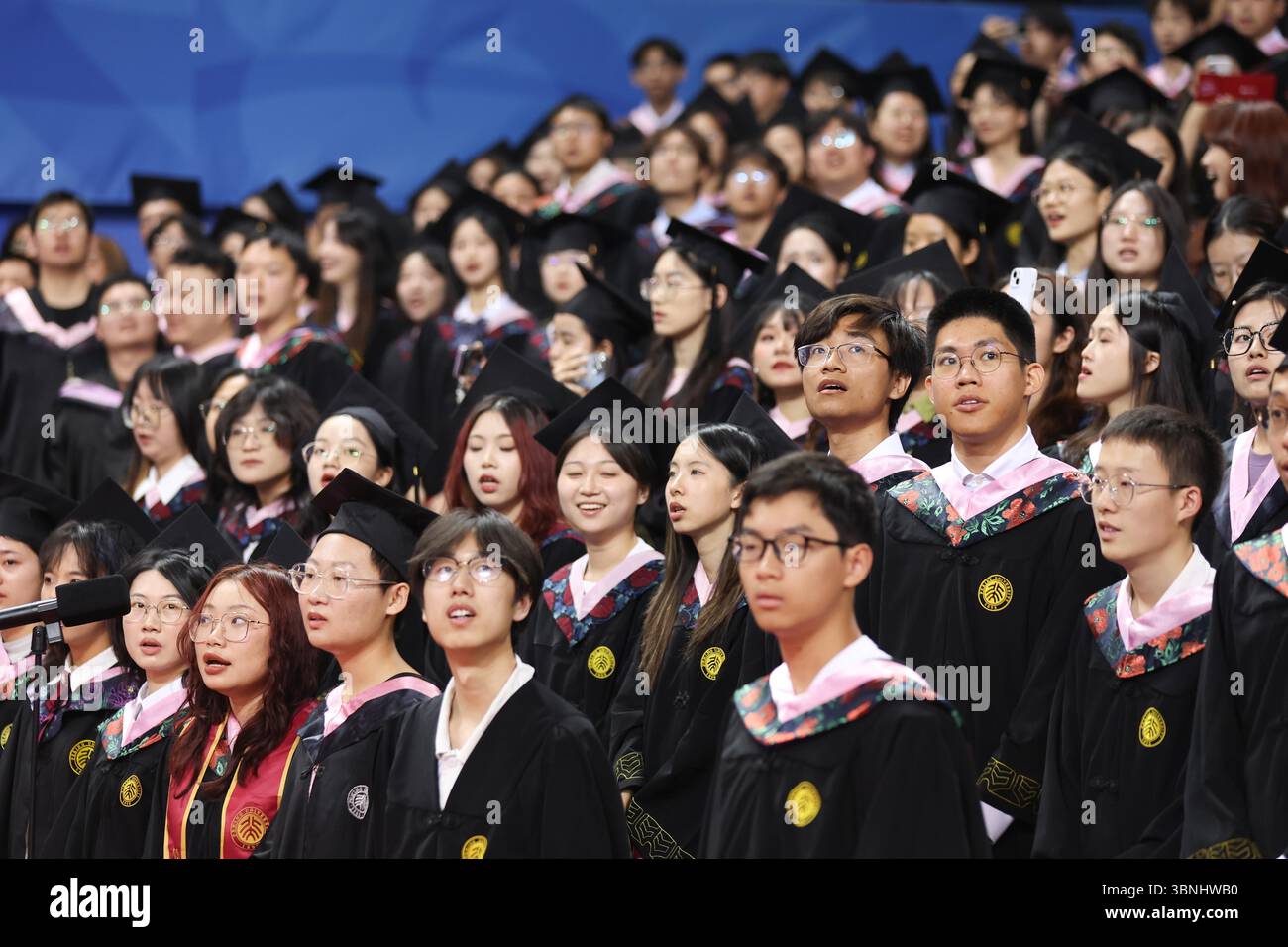 **CHINESE MAINLAND, HONG KONG, MACAU AND TAIWAN OUT** Graduates attend ...