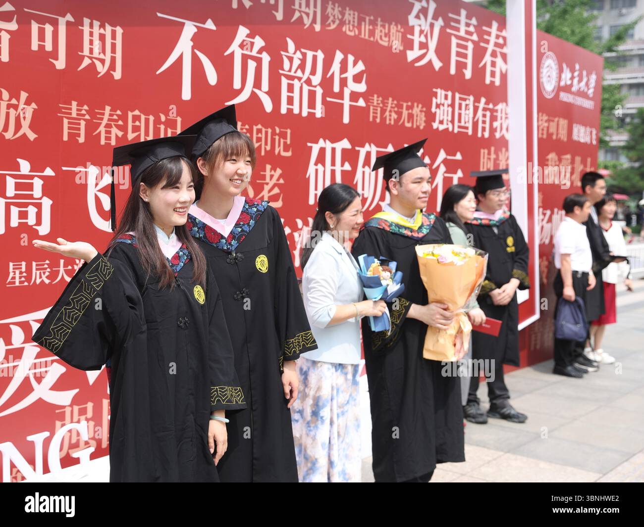 **CHINESE MAINLAND, HONG KONG, MACAU AND TAIWAN OUT** Graduates attend ...