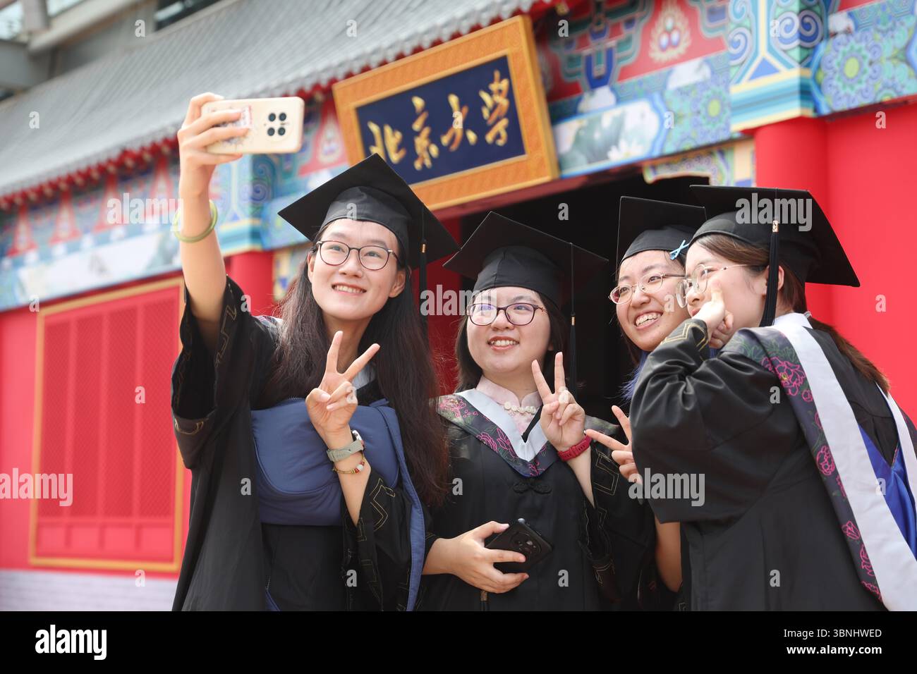 **CHINESE MAINLAND, HONG KONG, MACAU AND TAIWAN OUT** Graduates attend ...