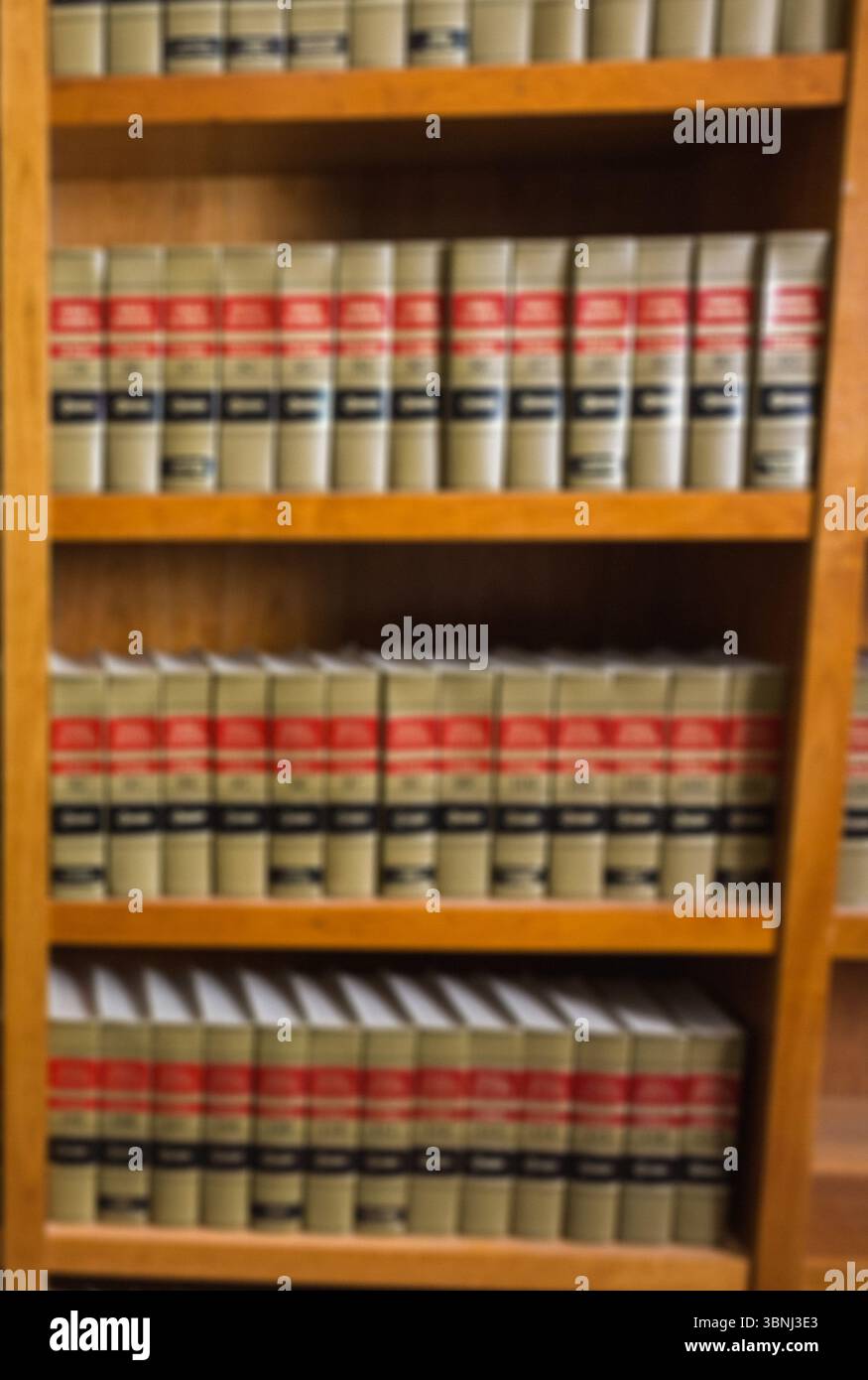 Volumes of books on shelf in library Stock Photo - Alamy