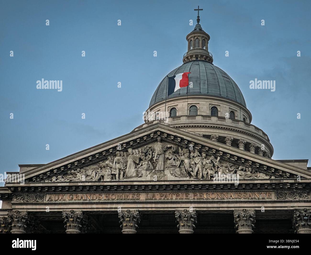 French flag waving on the Pantheon in Paris, neoclassical architecture ...