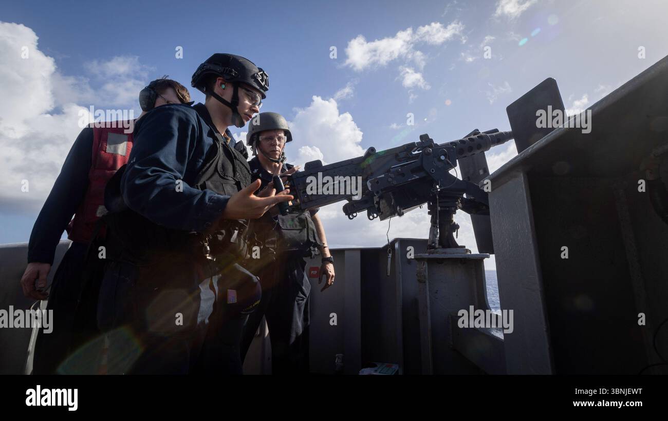 Aviation Ordnanceman Airman Grant Baier, assigned to Weapons Department ...