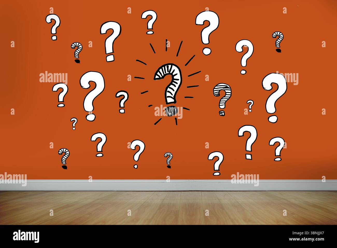 Question marks on orange wall Stock Photo - Alamy