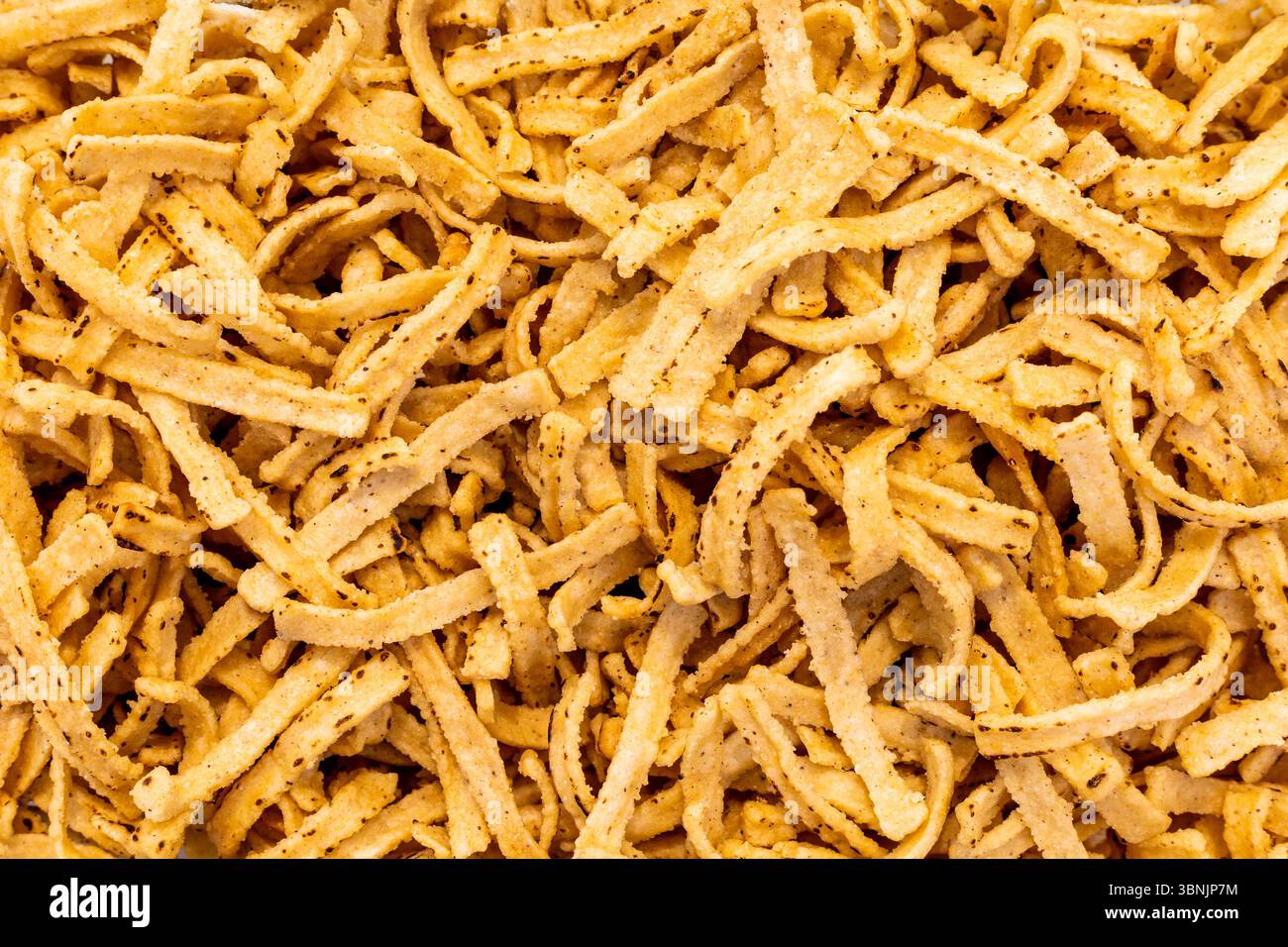 A detailed close-up image showcasing the crispy texture of fried ...