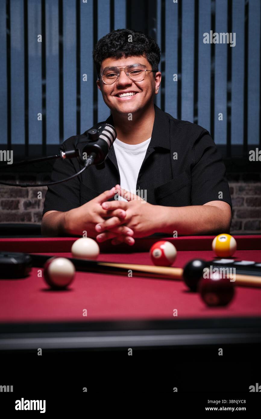 Hispanic man smiles recording hi-res stock photography and images - Alamy