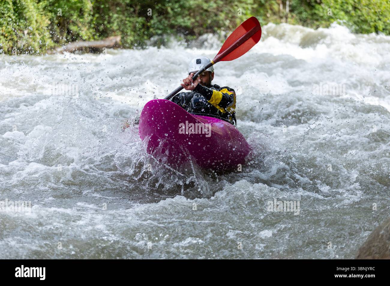 Man navigates white water rapids hi-res stock photography and images ...