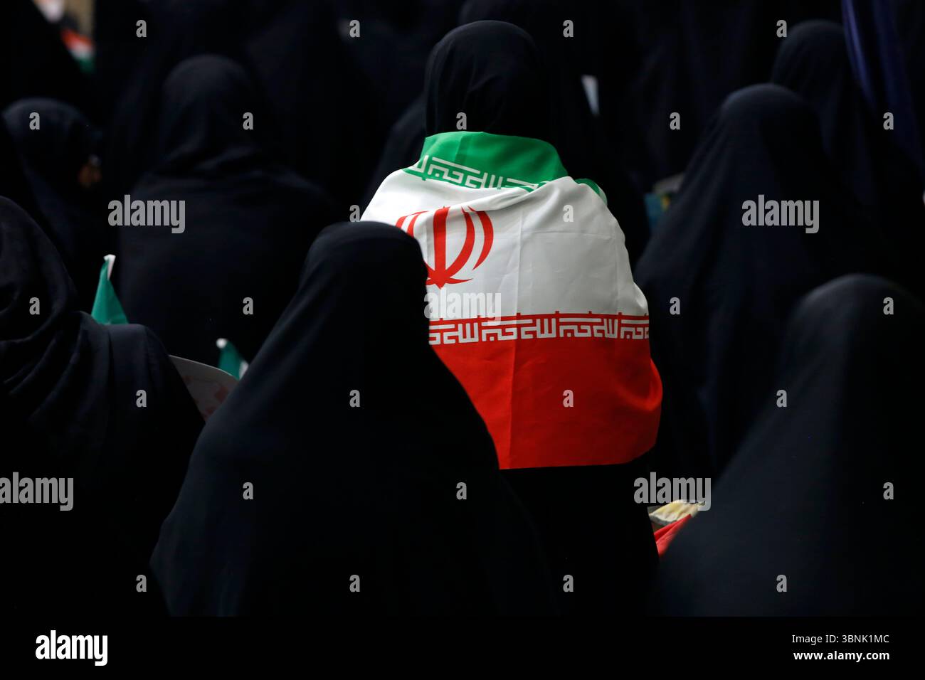 Tehran. 3rd July, 2025. People attend a memorial ceremony in Tehran ...