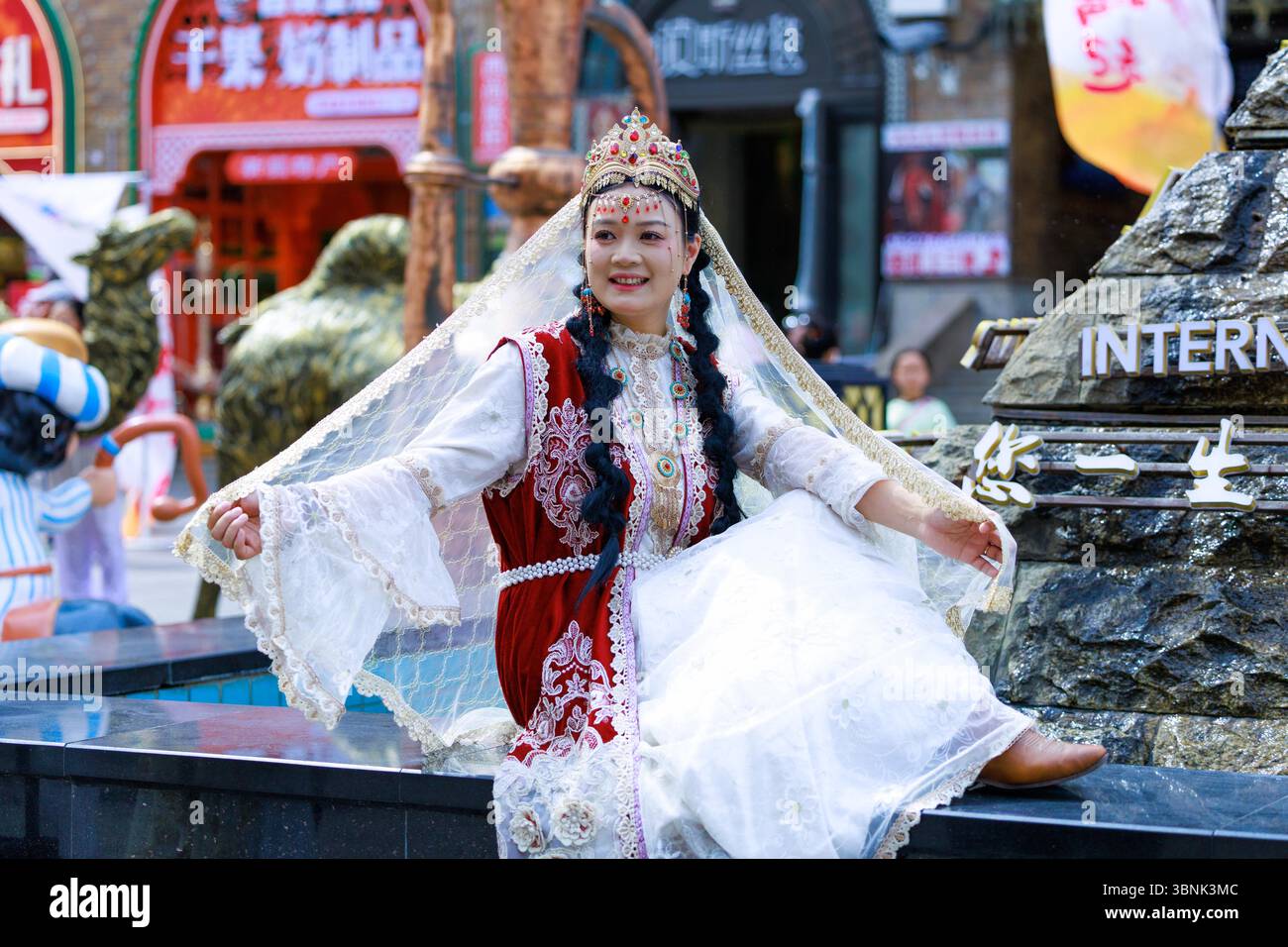 Tourists visit the Grand Bazaar in Urumqi City, northwest China's ...