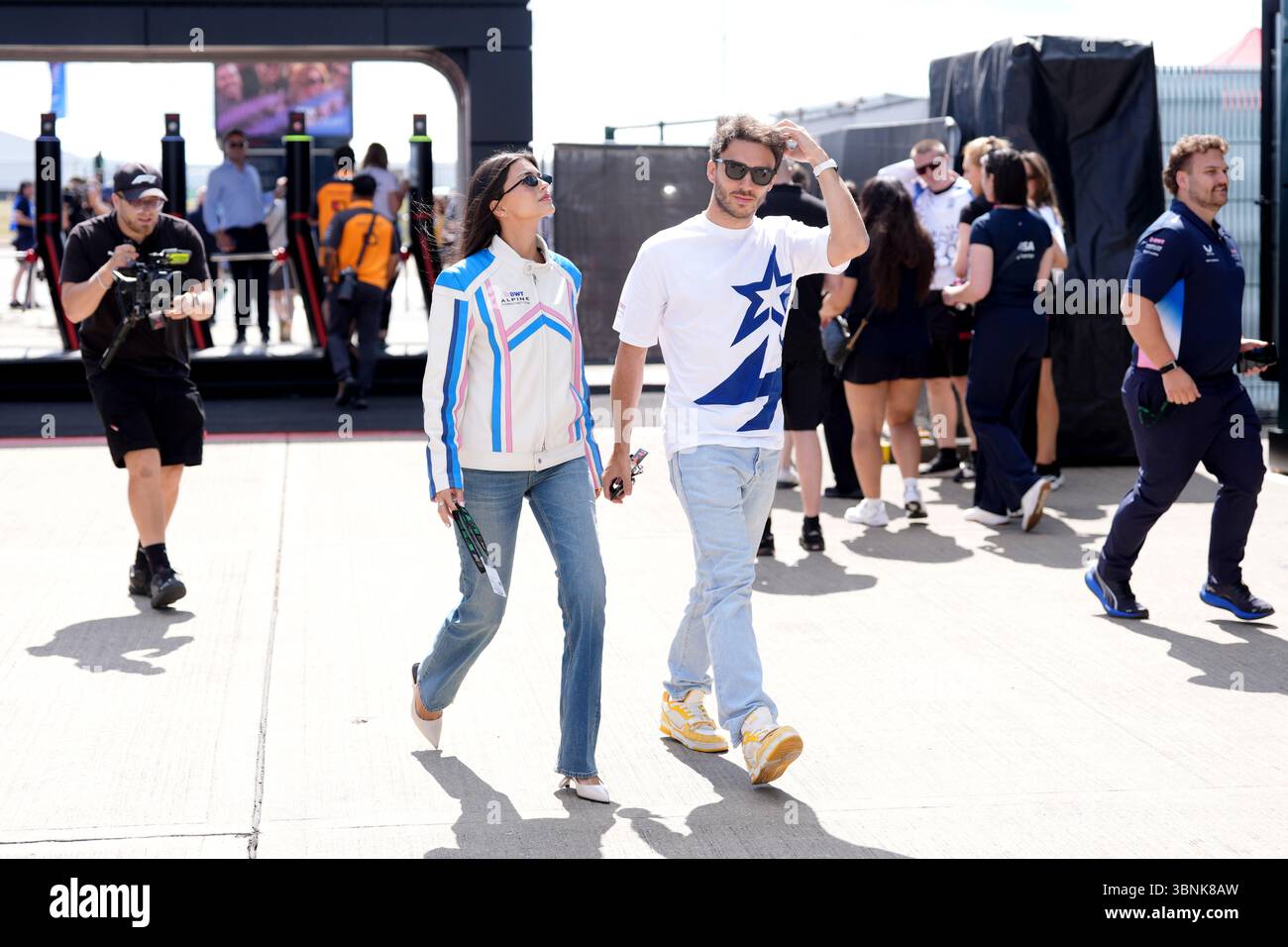 Francisca Gomes and Alpine driver Pierre Gasly arrive at Silverstone ...