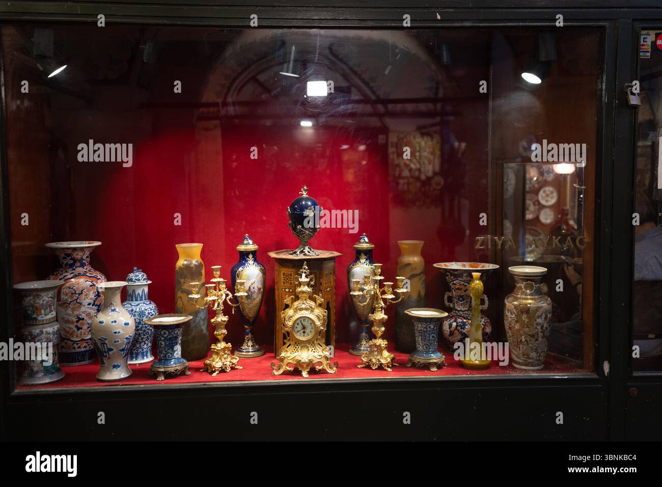 An impressive window display of antiques in the Grand Bazaar, one of ...
