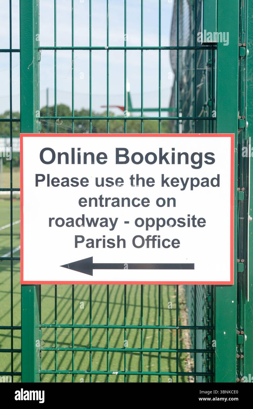 sign on iron railing gate saying online bookings this way UK Stock ...