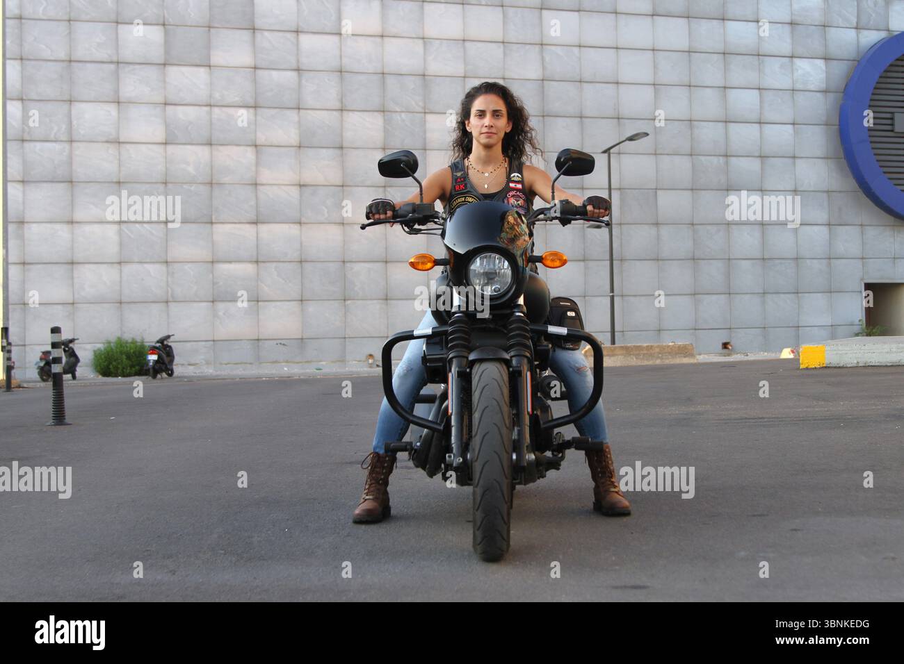 Arab female motor rider hi-res stock photography and images - Alamy