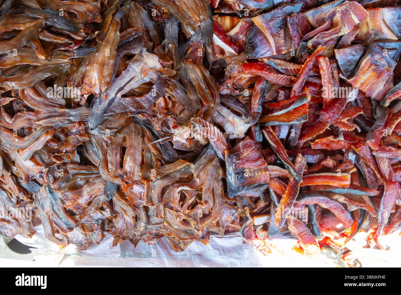 Grilled Fish Heads for Sale at Southeast Asian Market Stock Photo - Alamy