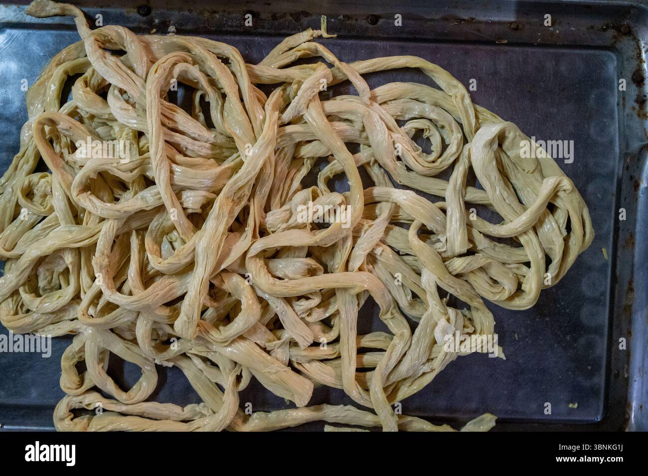 Tofu noodle making hi-res stock photography and images - Alamy