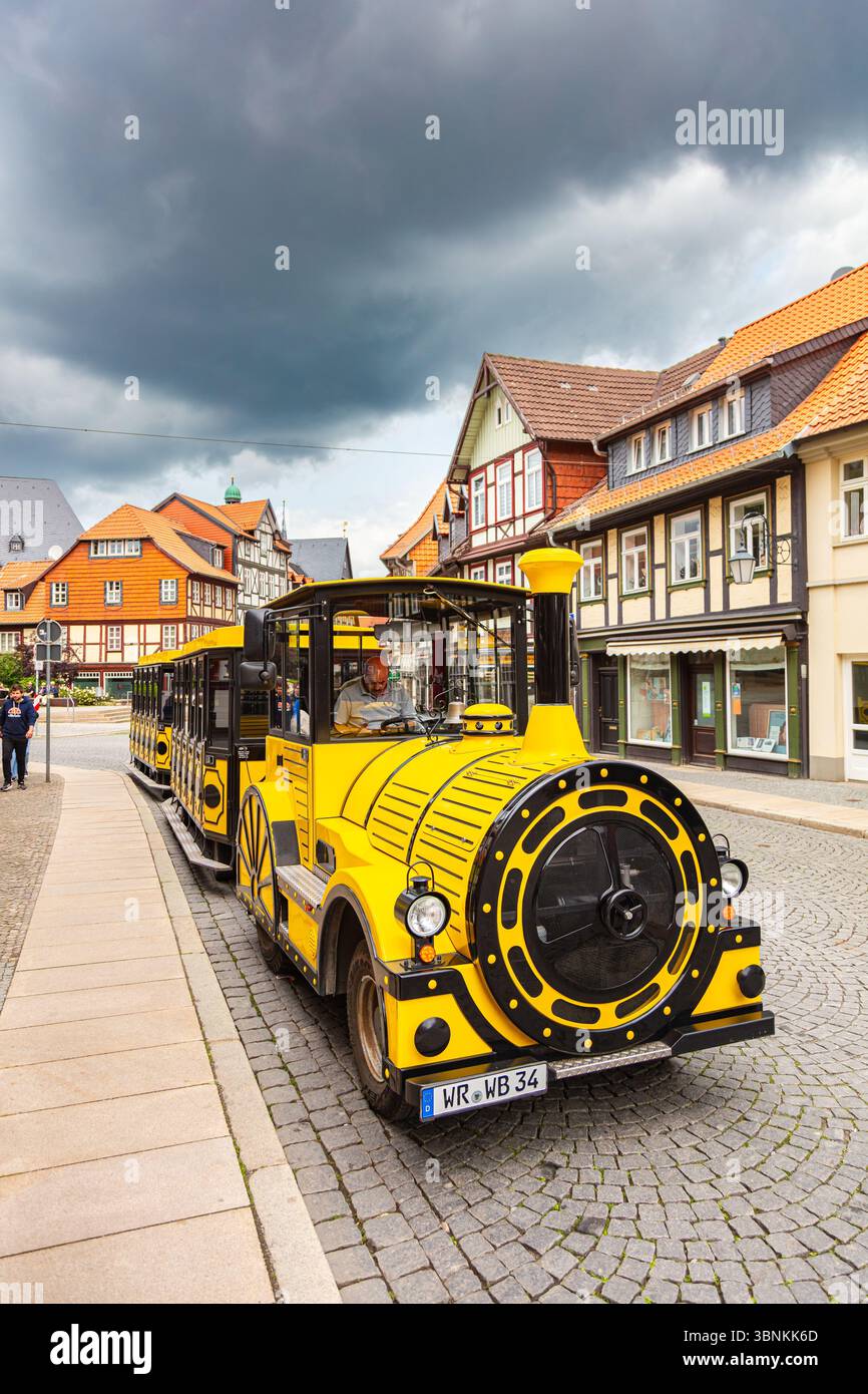 Wernigerode, Germany – 11. June 2025: Bright yellow tourist train ...