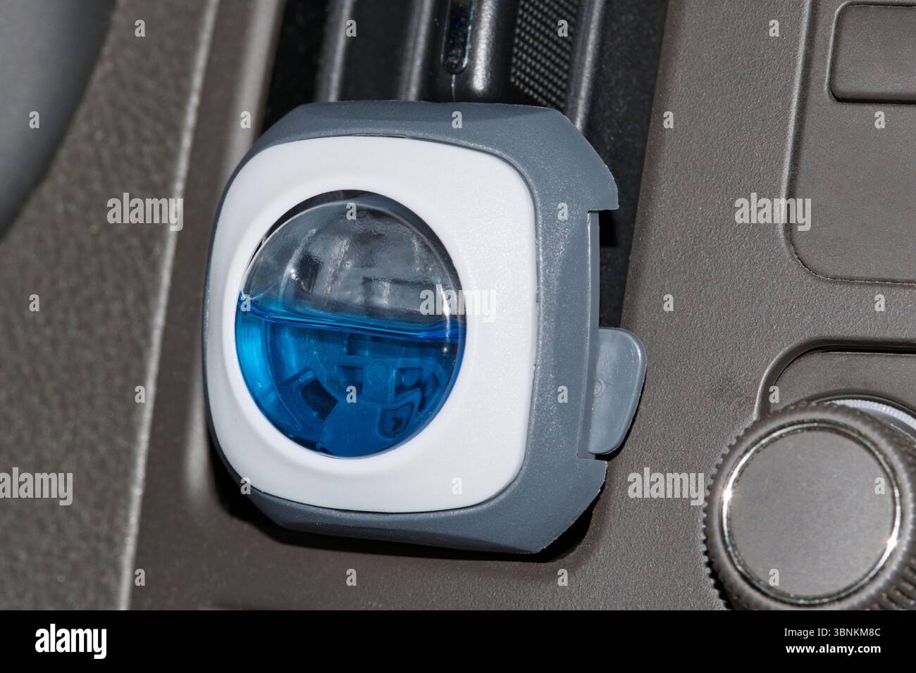 Car air freshener vent clip in vehicle air conditioner vent with liquid ...