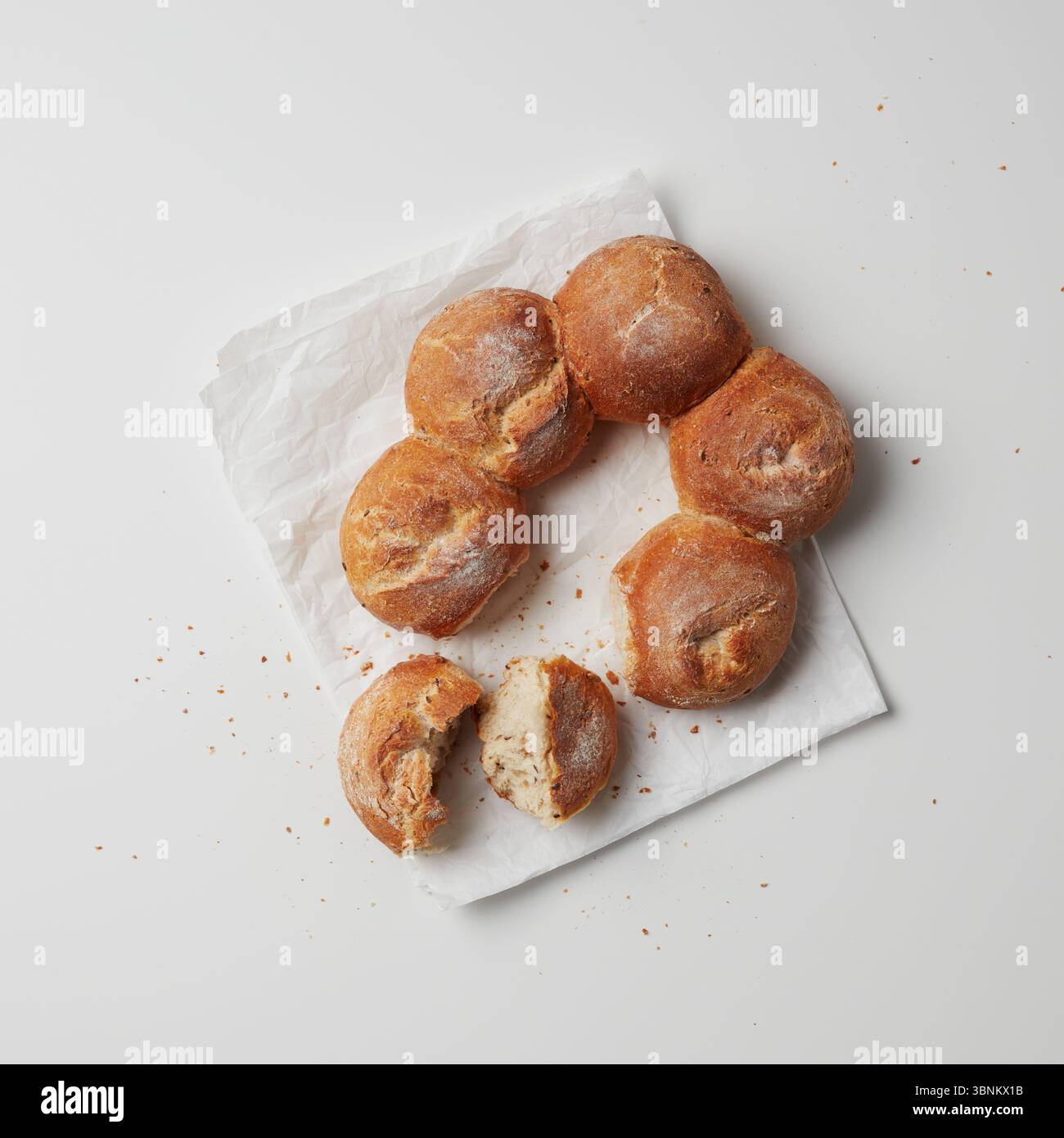 Round donut cracked on paper Stock Photo - Alamy