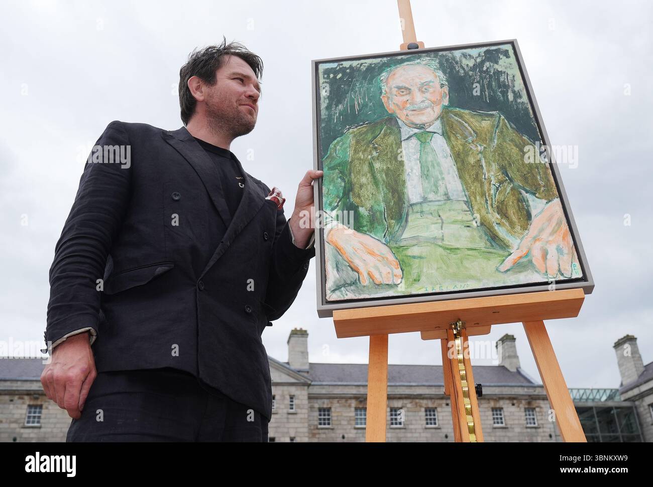 Welsh artist, Dan Llywelyn Hall with one of his portraits of the last ...