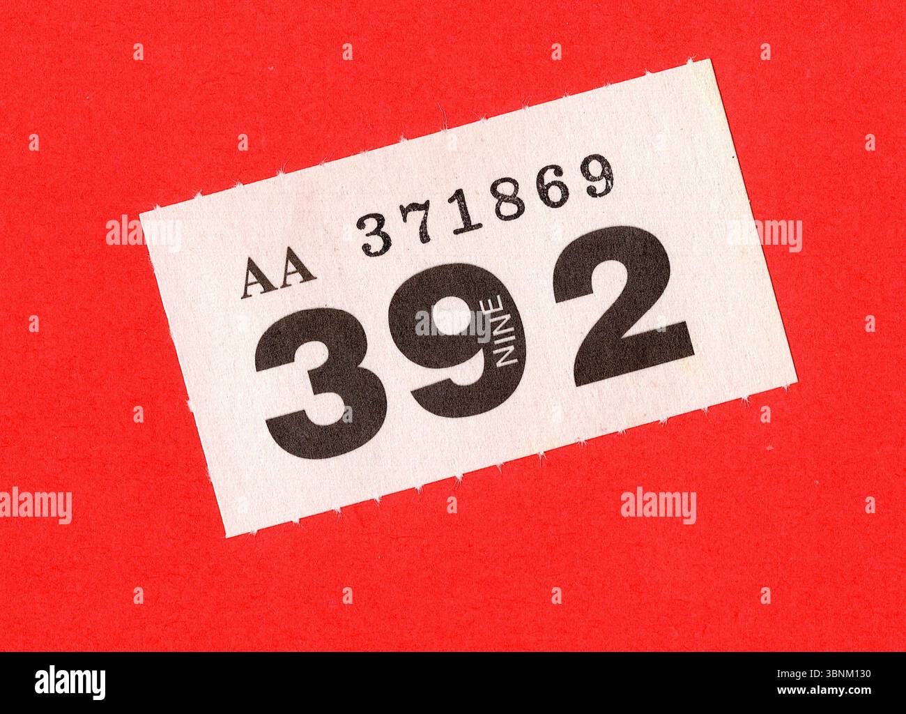 A single vintage raffle ticket on a bright coloured background Stock ...