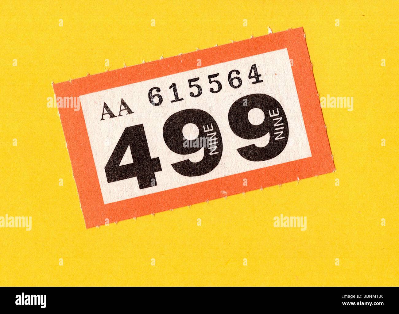 A single vintage raffle ticket on a bright coloured background Stock ...