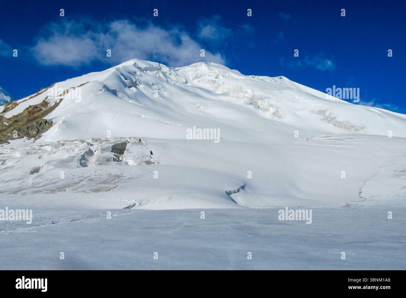 Snow-covered mountains around Lenin Peak or Ibn Sina Avicenna Peak ...