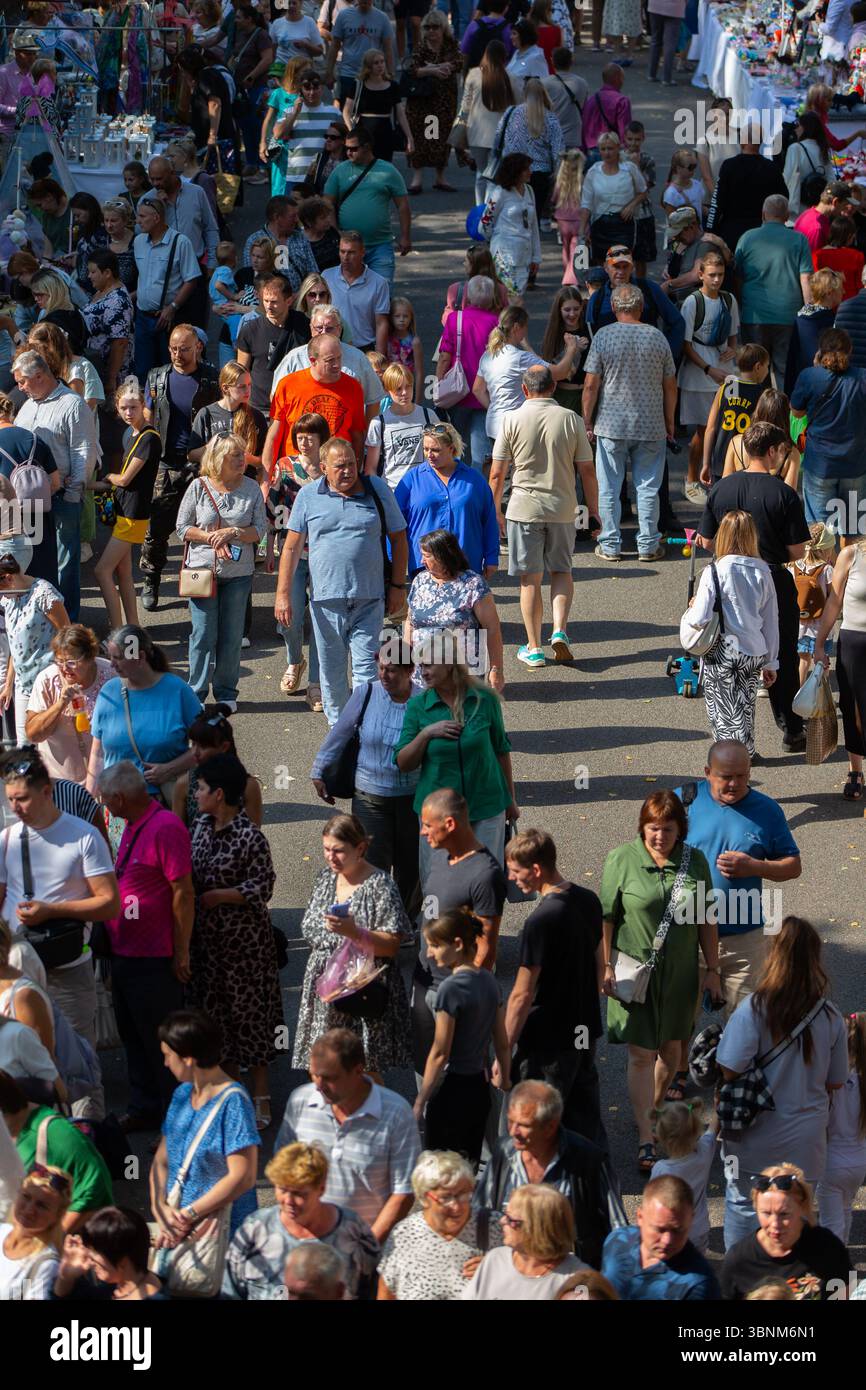 September 14, 2024. Belarus. City fair. Crowd of people photographed ...