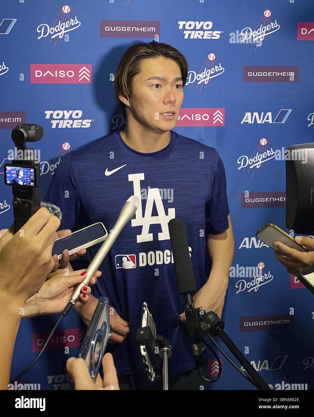Los Angeles Dodgers pitcher Yoshinobu Yamamoto meets the press after ...