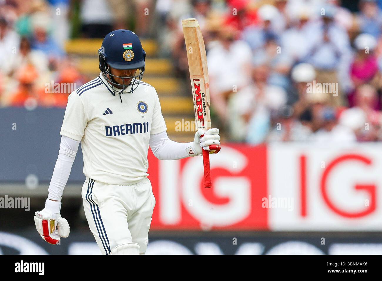 #77, Shubman Gill of India raises his bat as he reaches 250 runs during ...