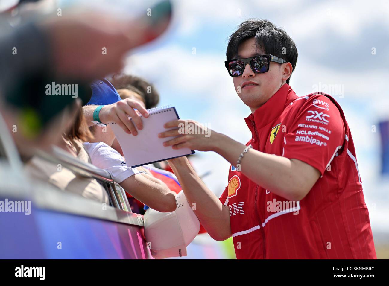 NORTHAMPTON, ENGLAND - JULY 3: Zhou Guanyu of China and Scuderia ...