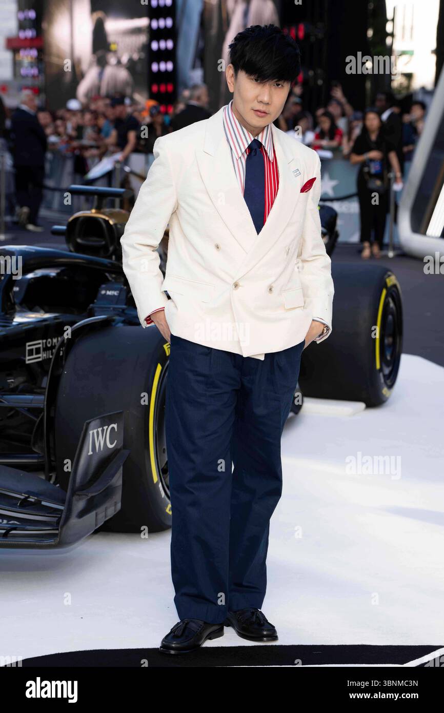 JJ Lin poses for photographers upon arrival at the premiere of the film ...