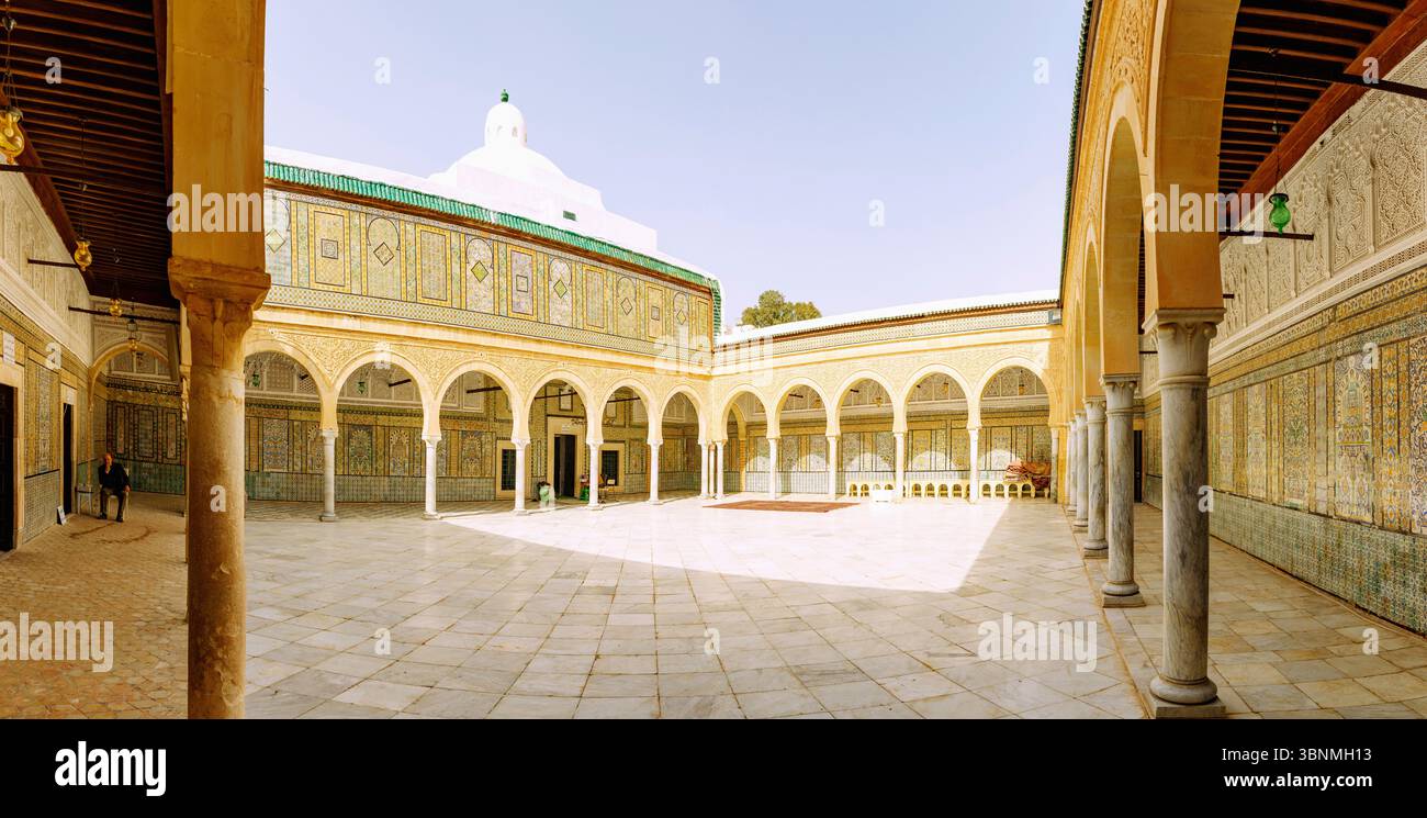 Colonnade decorated with colorful tiles and inner courtyard of the ...