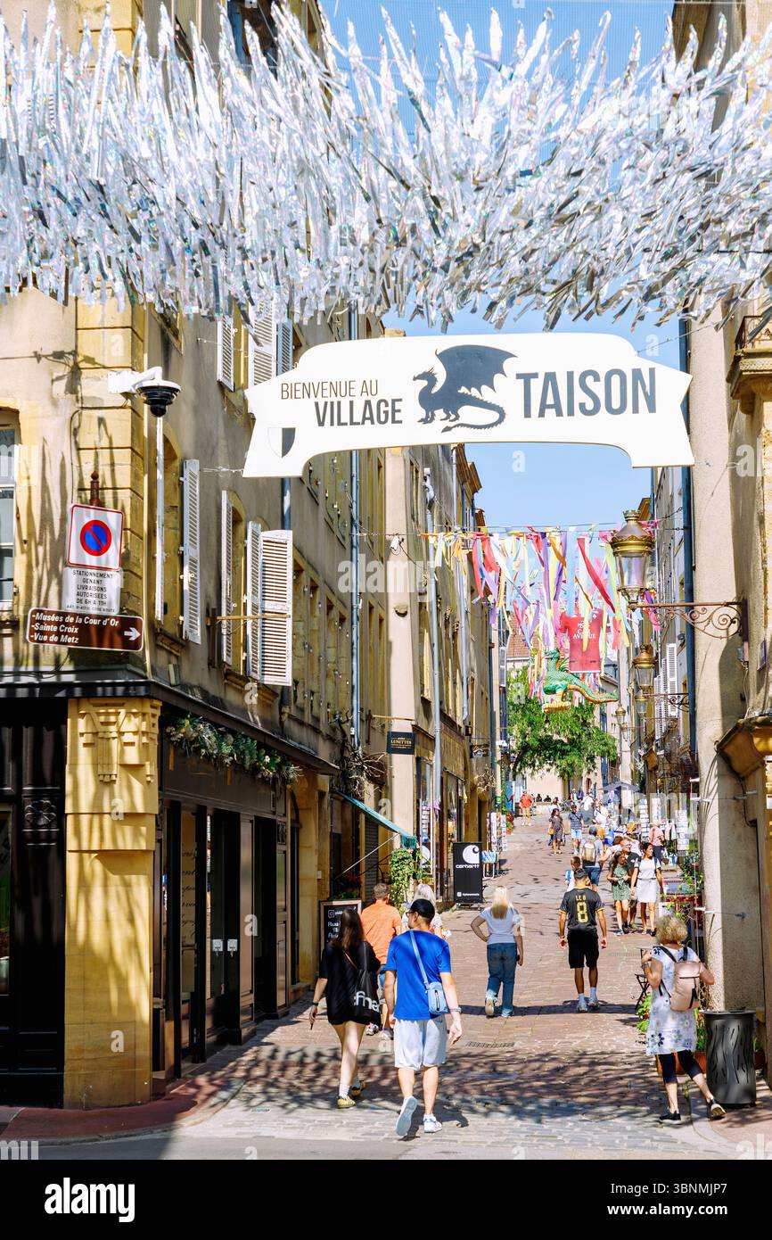 Old town street decorated with colorful stripes and the legendary ...