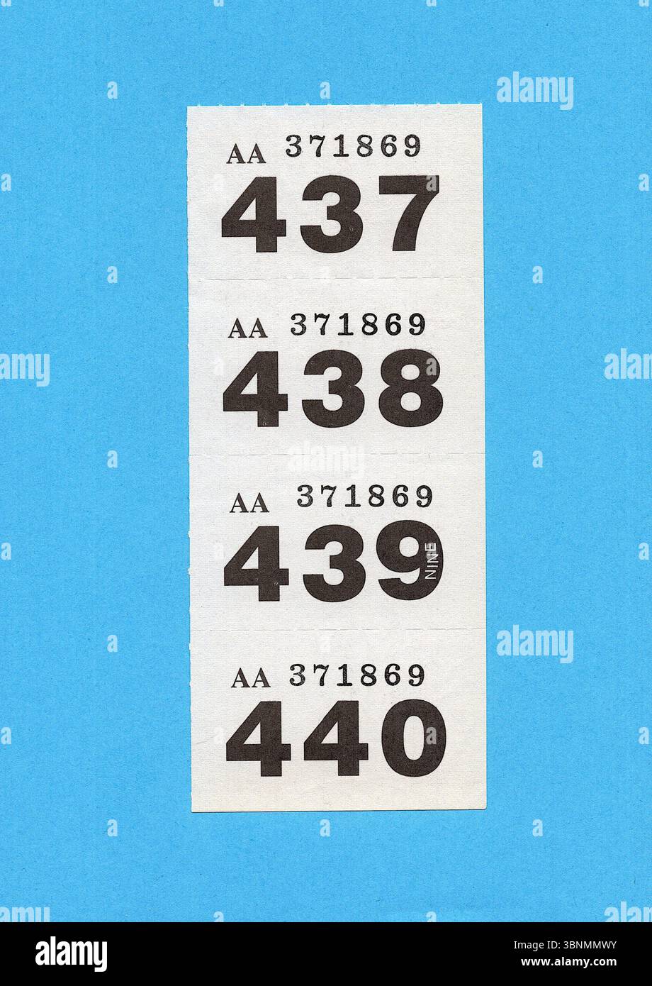 A strip of vintage raffle tickets on a bright coloured background Stock ...