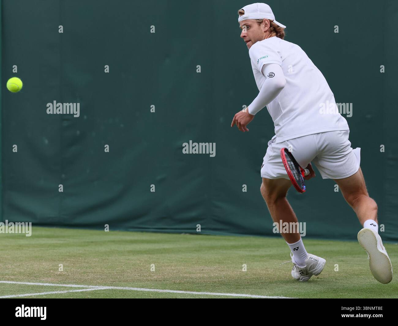 Belgian Zizou Bergs pictured in action during a doubles tennis match ...