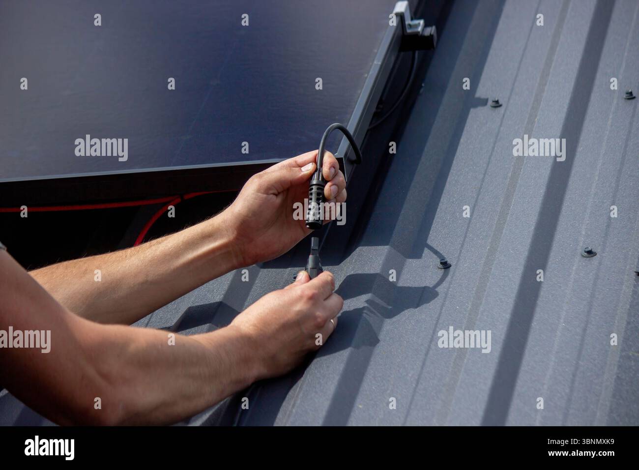 Electrician on roof installing hi-res stock photography and images - Alamy