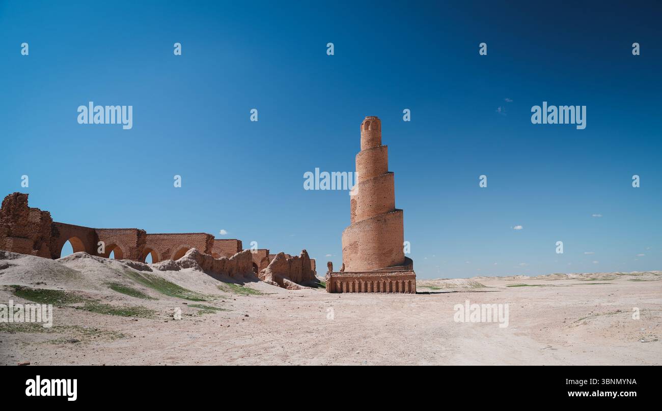 Historic minaret stands tall amid the desert landscape of Abu Dulaf ...