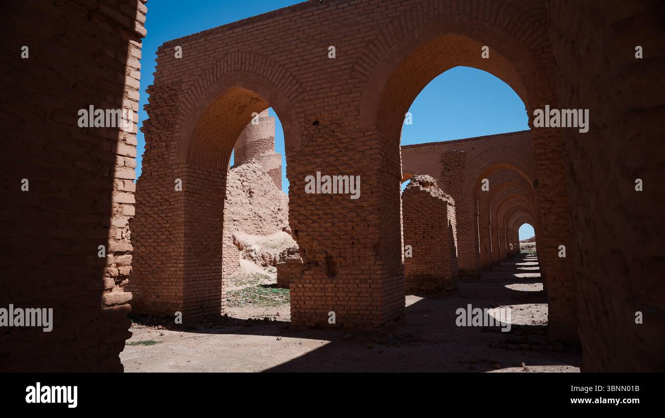 Visitors wander through the remarkable ruins of Abu Dulaf in Iraq ...