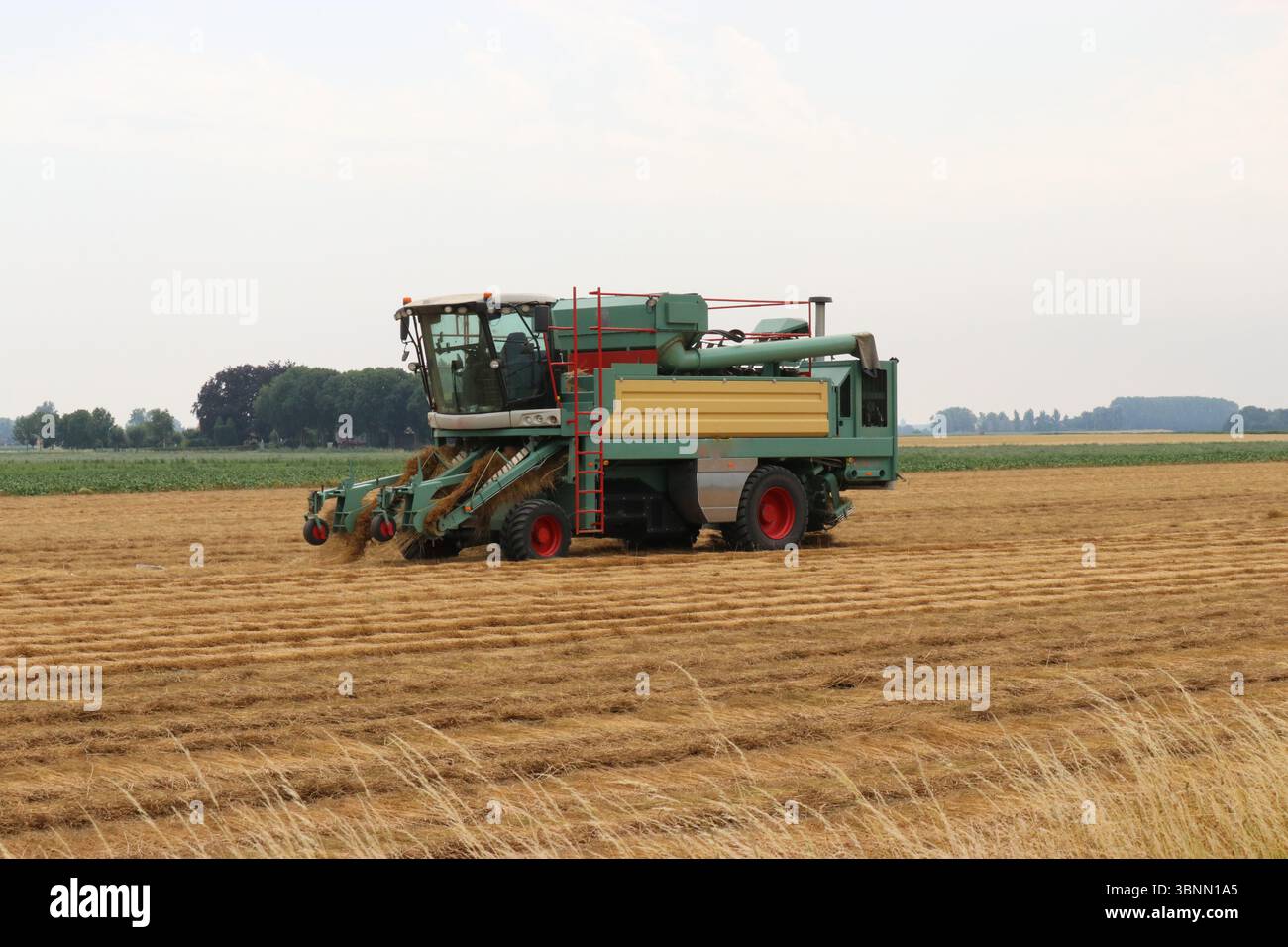 Flax threshing machine hi-res stock photography and images - Alamy