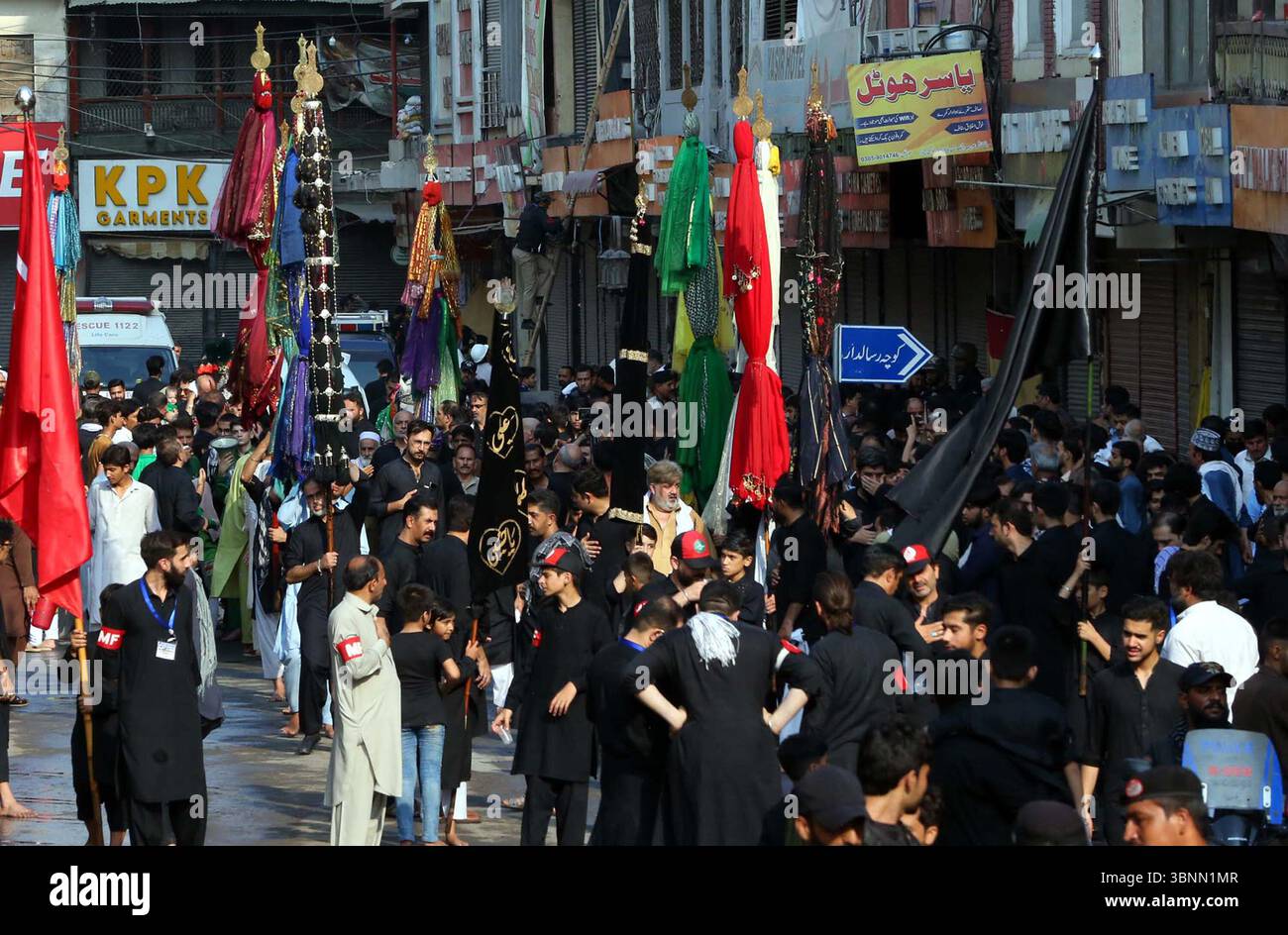 Shiite Muslims mourners to Imam Hussain (A.S) are participating religious procession to show ...
