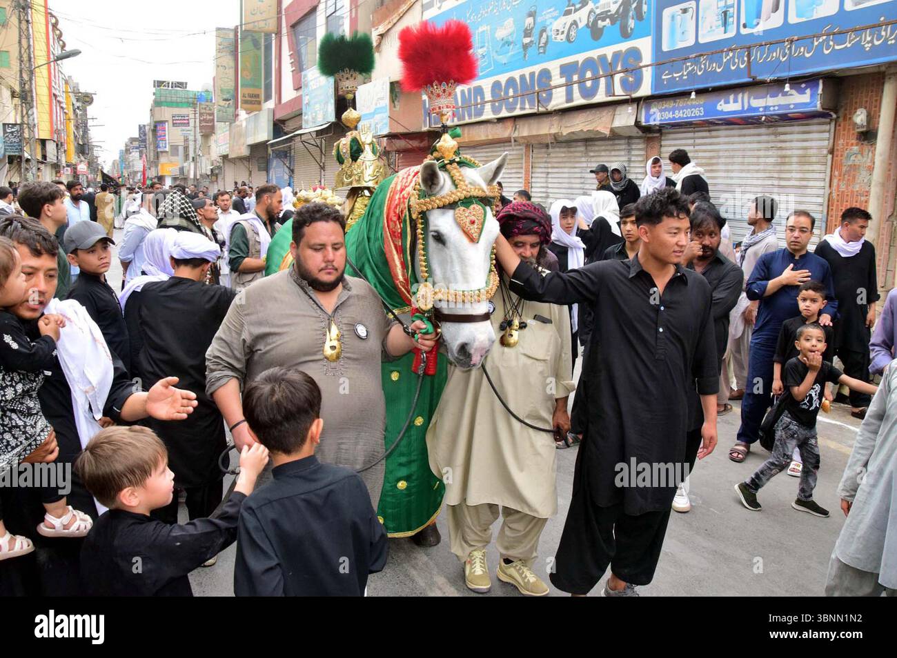 Shiite Muslims mourners to Imam Hussain (A.S) are participating religious procession to show ...