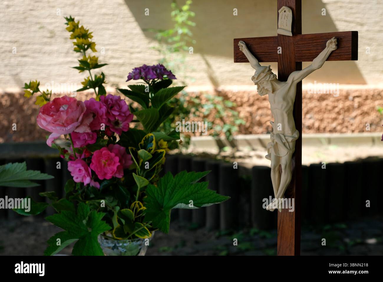 Wooden Cross with Jesus Christ Crucifixion Decorated with Flowers ...